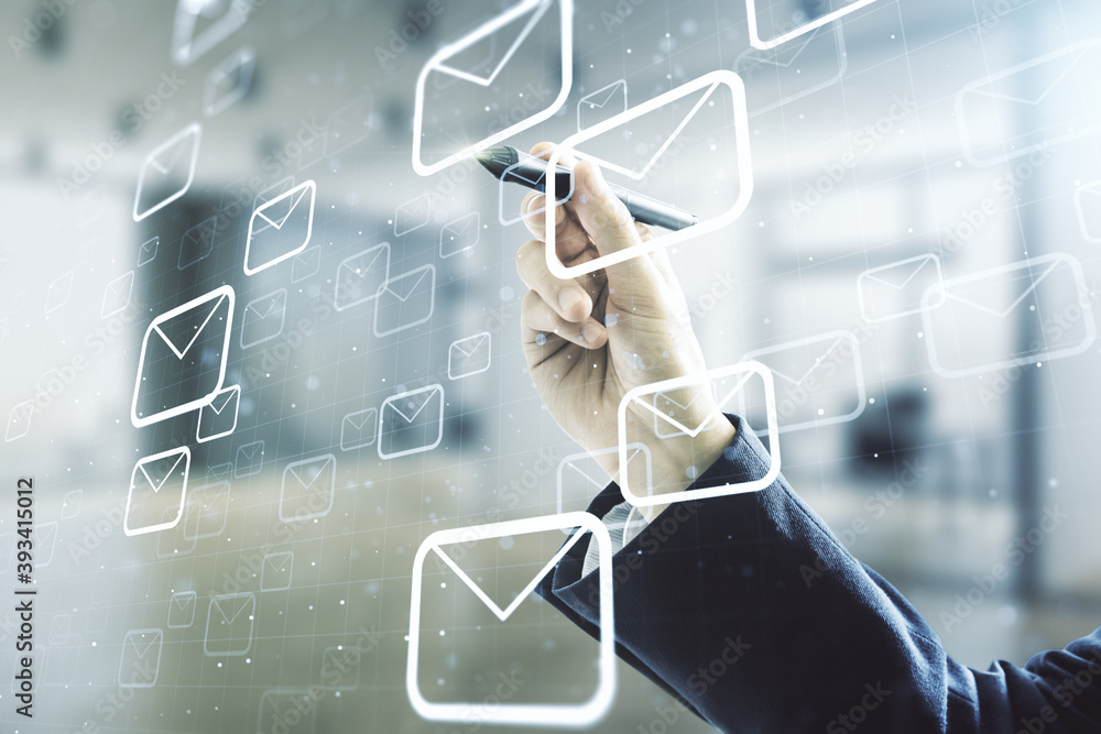 Man hand with pen working with abstract virtual postal envelopes ...