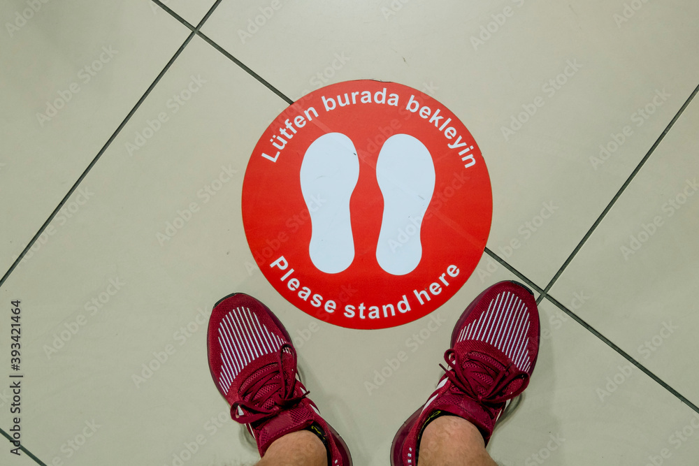 Social distance signs for passengers at Antalya international airport ...