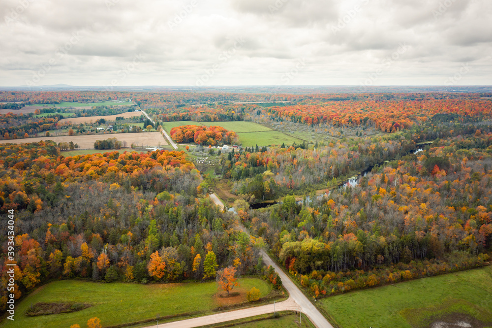 Beautiful fall aerial photograph of farm land, river and woods in ...