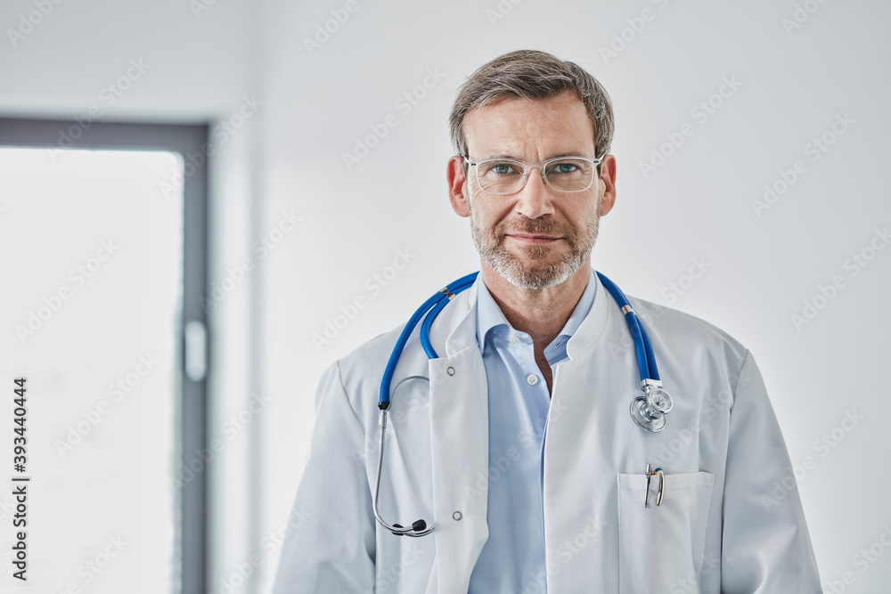 Internist with stethoscope Stock Photo | Adobe Stock