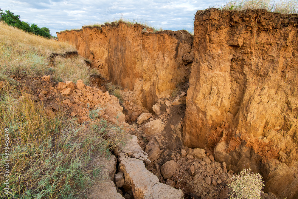 Soil landslide on slopes after degradation of the soil rain or ...