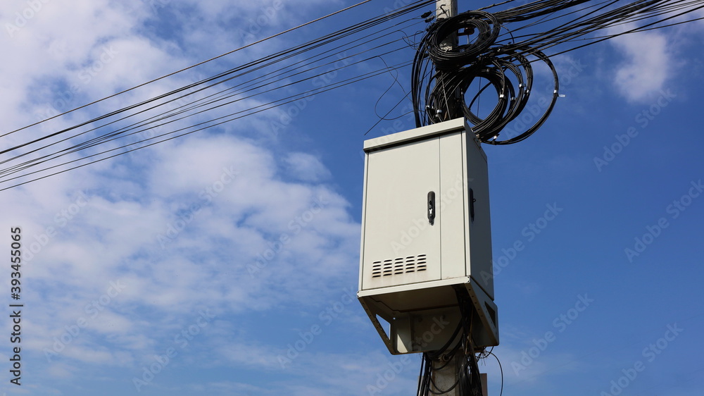 NODE cabinet on concrete columns. High speed internet fiber optic ...