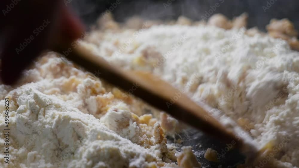 Traditional preparation of dough for meat croquettes with béchamel and ...