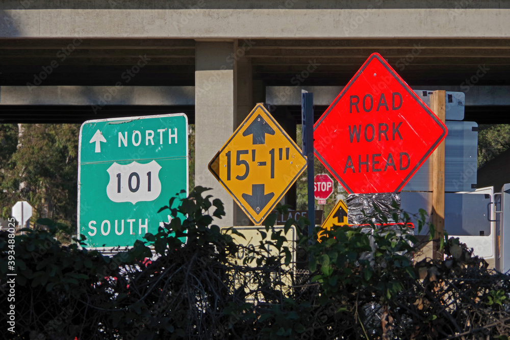 Close look at a conglomerate of much too many signs in one view and ...