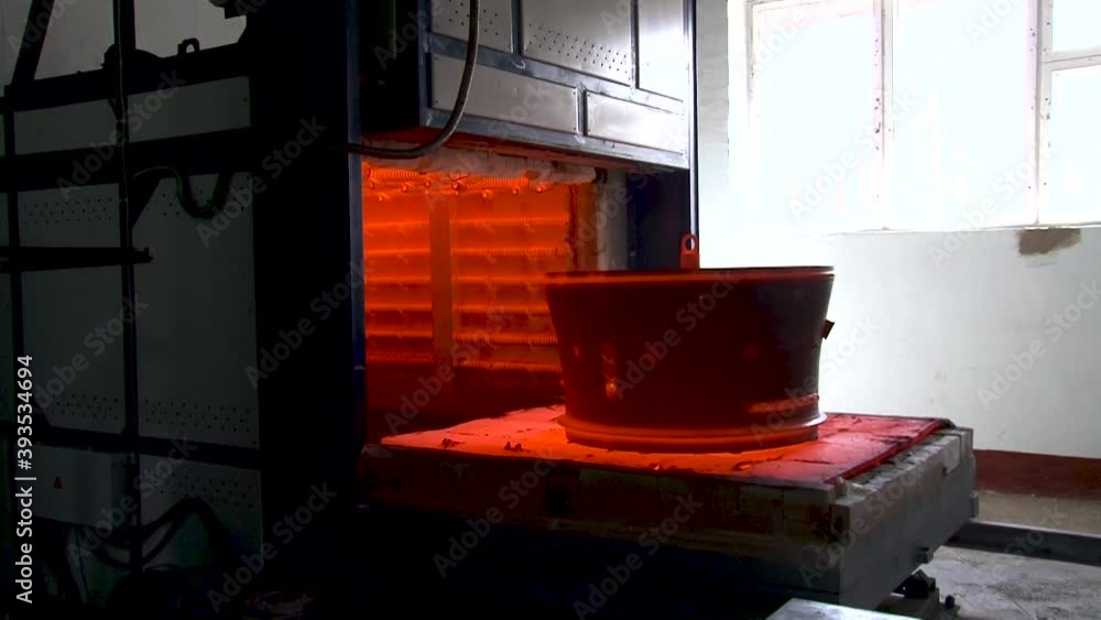 Automatic rolling out of thermal furnace of diffuser body of jet engine ...