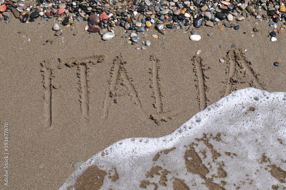 Italia, written on a sandy beach - Italia Schriftzug im Sand des ...