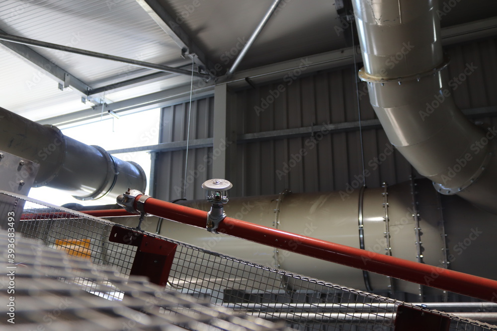 Fire Sprinklers on conveyor belts foto de Stock | Adobe Stock