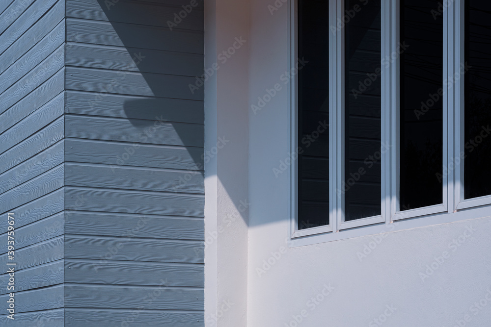 Perspective side view of glass windows on white cement and gray ...