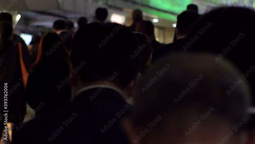 TOKYO, JAPAN : Crowd of people at the street in night time rush hour ...