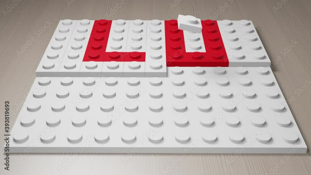 The word LOVE made from blocks. Animation of plastic bricks falling ...