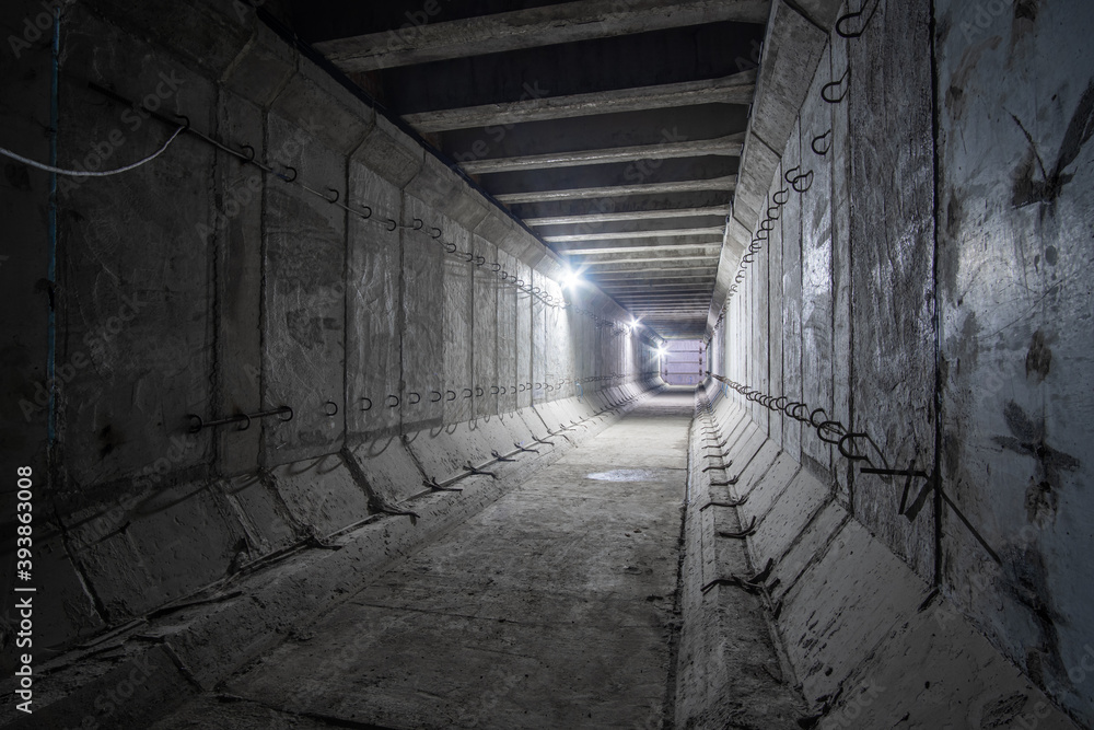 Large empty square reinforced concrete tunnel. Construction of a ...
