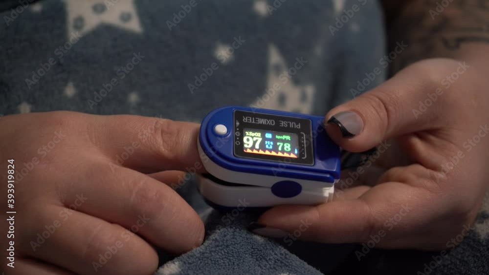 Europe, Kiev, Ukraine - November 2020: Women's hands measure oxygen ...
