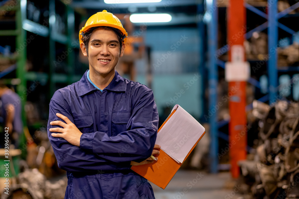 Portrait of Asian factory man or warehouse worker with smiling and ...