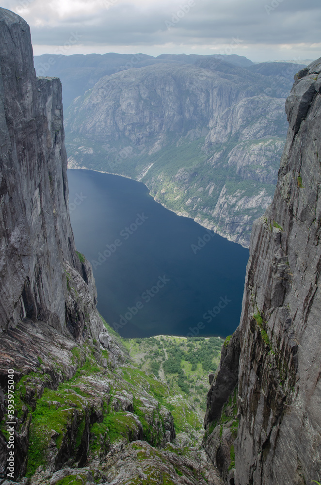 Steep cliff faces and the fjord from the Kjerag Boulder, Norway Stock ...