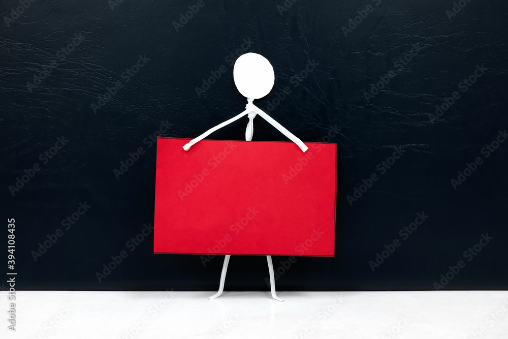 One stick man figure holding blank red placard or notice or ...