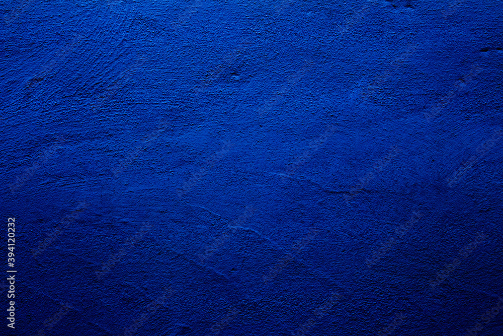 Blue colored abstract wall background with textures of different shades ...