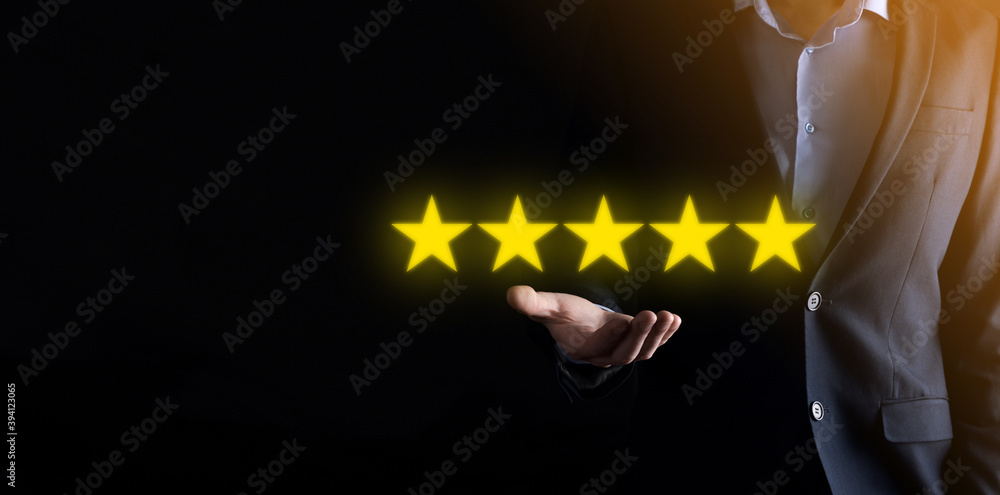 Man hand showing on five star excellent rating.pointing five star ...