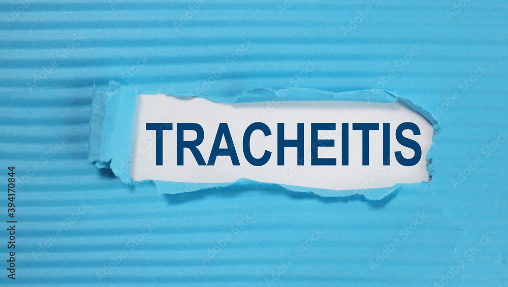 Tracheitis, text on white paper over torn paper background. medical ...