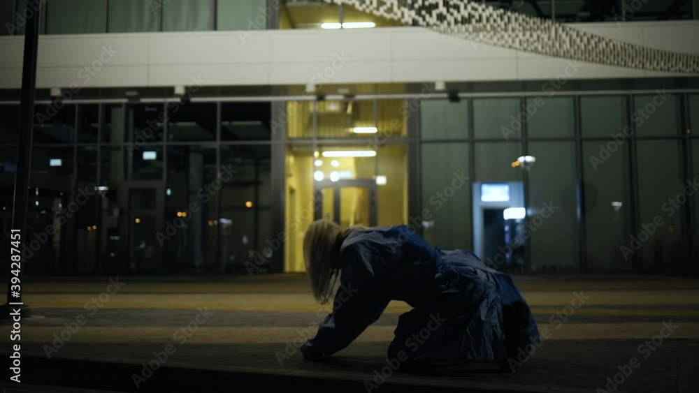 Exhausted medical intern crying in front of hospital after death of ...