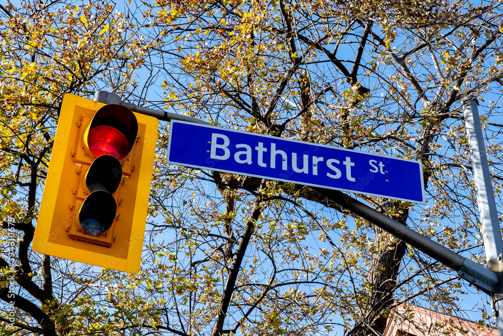 Bathurst Street sign with traffic light is seen in downtown Toronto ...