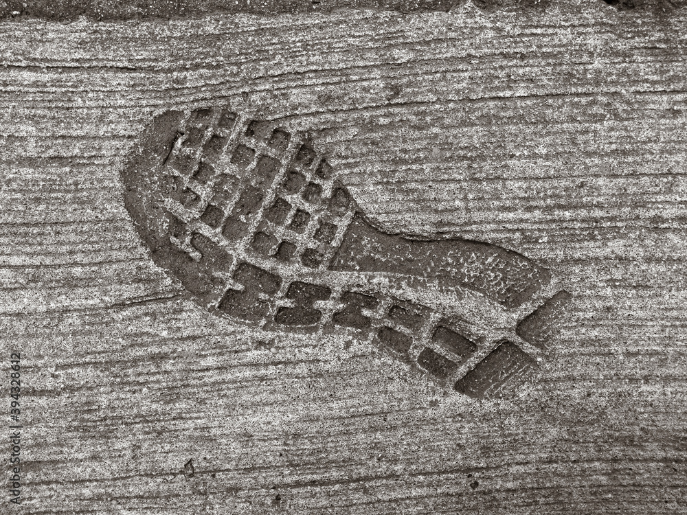 Image of a shoe print. Man shoe print left in concrete cement. Man ...