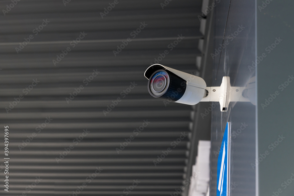 Security CCTV camera surveillance system outdoor of house. A blurred ...