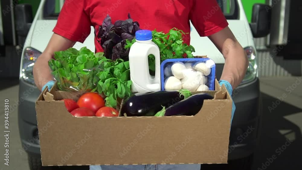 Volunteer hold box with food, social help Spbd. Closeup of man hand ...