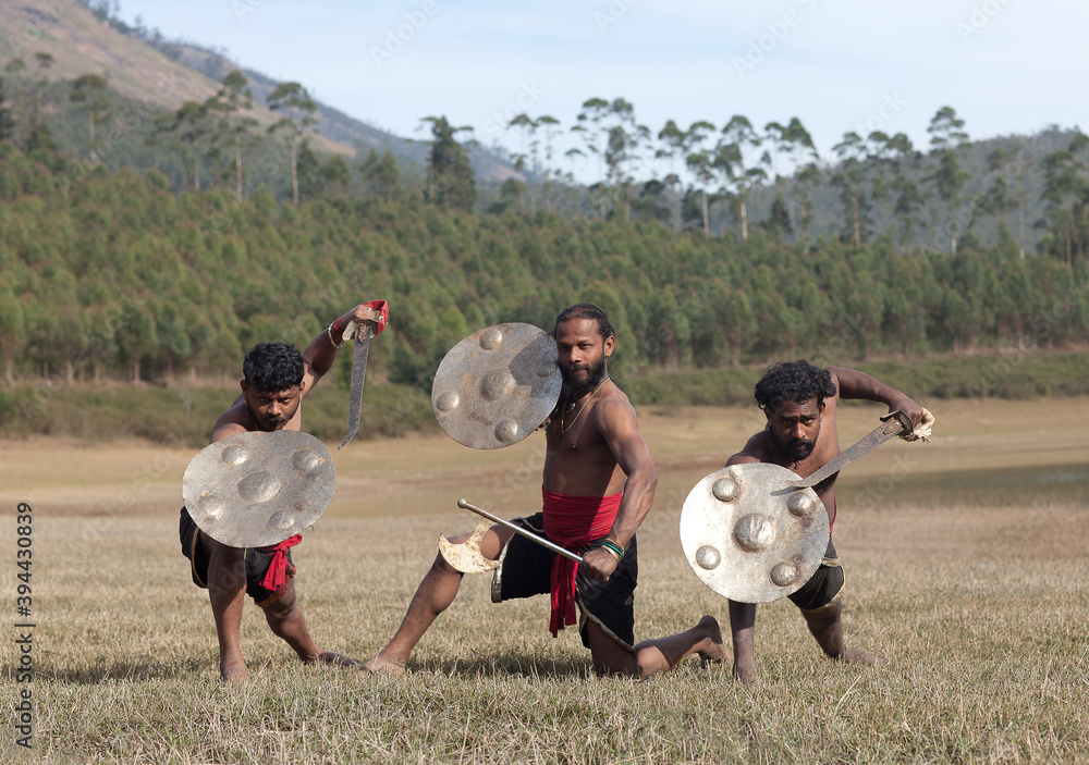 Indian fighters with sword and shield - Kalaripayattu martial art ...