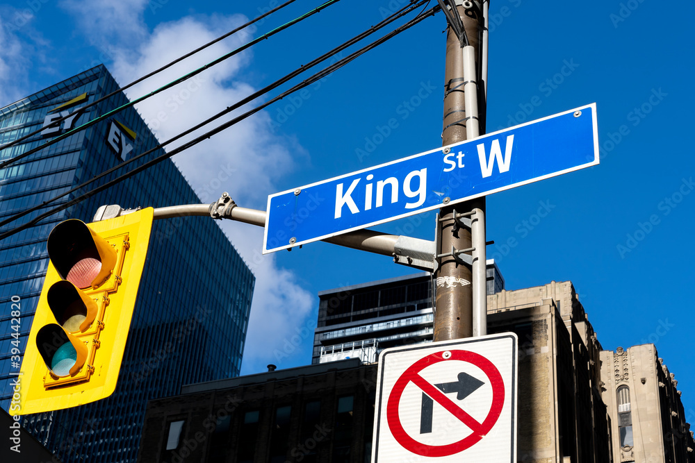 King Street W sign with traffic light is seen in downtown Toronto ...