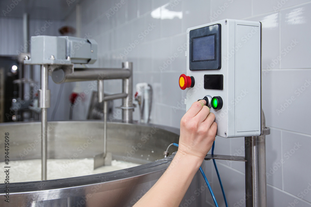 equipment of a private cheese factory and stages of preparation and ...