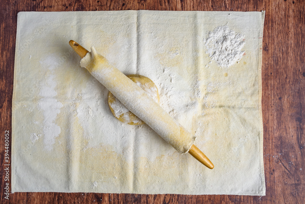 Preparation for baking, ball of sugar cookie dough on a pastry cloth ...