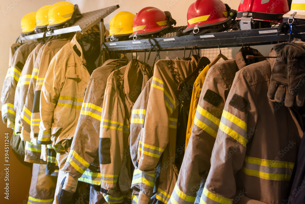 Foto de Firefighter's uniforms and gear arranged at fire station do ...