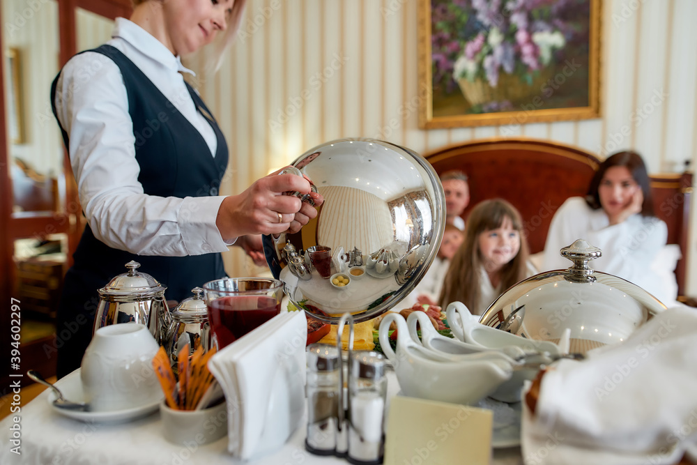 Eat and Drink. Caucasian parents and two kids waiting for breakfast ...