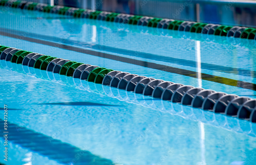 Plastic Floats Create A Swim Lane In This Outdoor Pool, All Set Up For ...