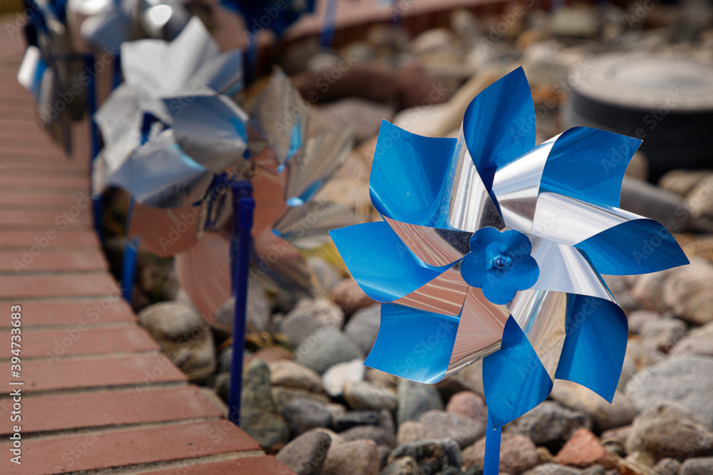 Blue and White Pinwheel Display for Child Abuse Prevention Stock Photo ...