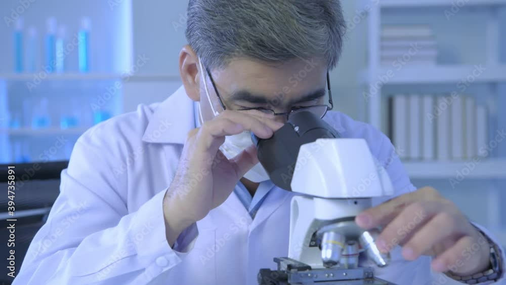Research concept of 4k resolution. Asian scientists are examining the ...