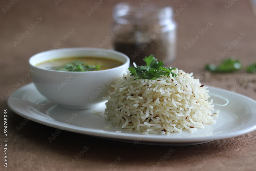 Jeera rice served with dal fry, a popular north Indian food Stock Photo ...