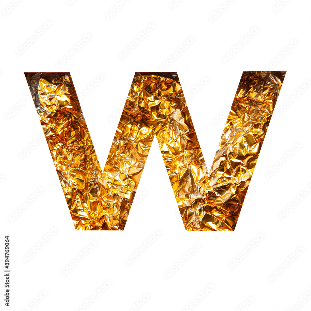 Gold letter W of English alphabet of shiny crumpled foil and paper cut ...