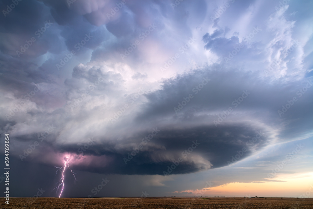Supercell with dramatic storm clouds and lightning wall mural wallpaper ...