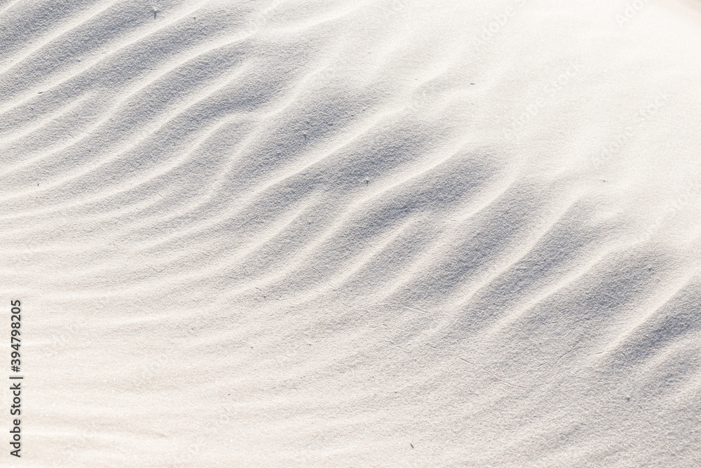 Light shadows and patterns on the sand of dune. Beautiful sand`s ...
