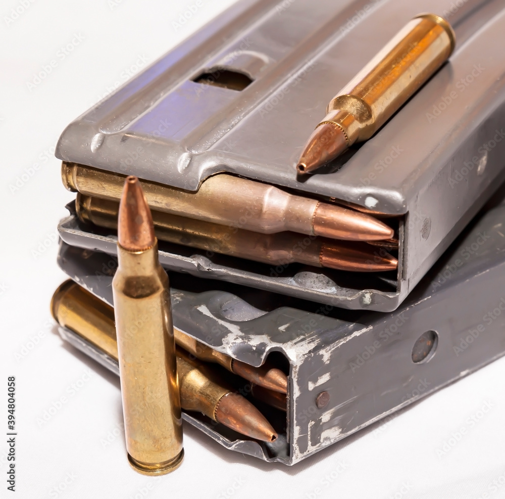 Two loaded rifle magazines with 223 caliber bullets with two additional ...
