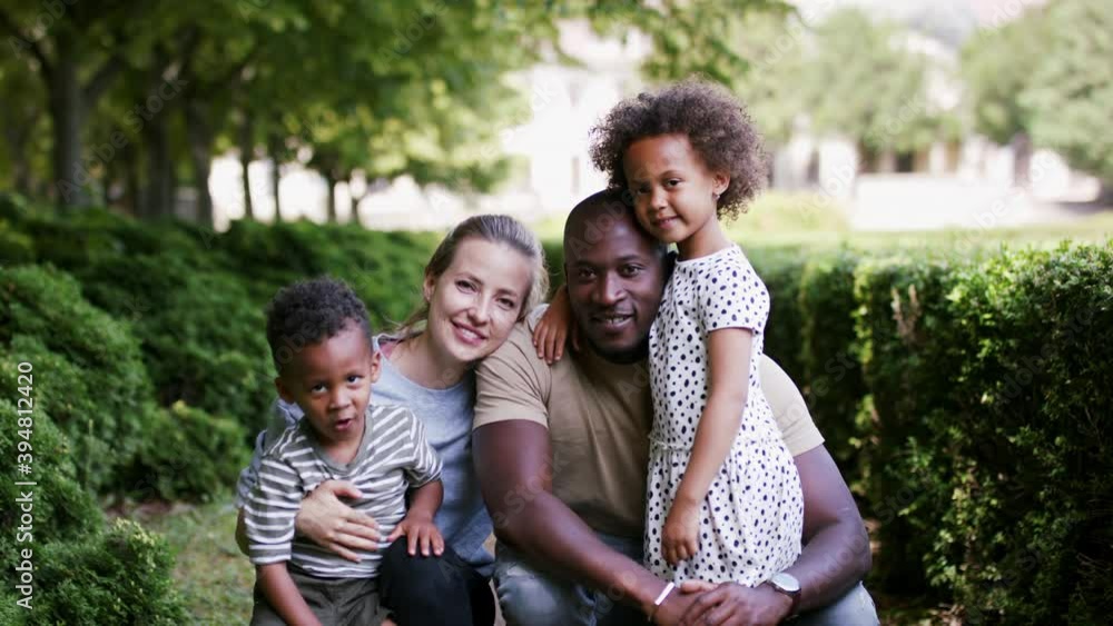 Multiracial family on walk in public park. Stock Video | Adobe Stock