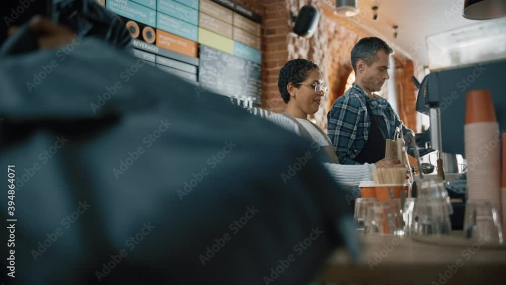 Friendly Latin Barista Serves Order to a Food Delivery Courier Picking ...