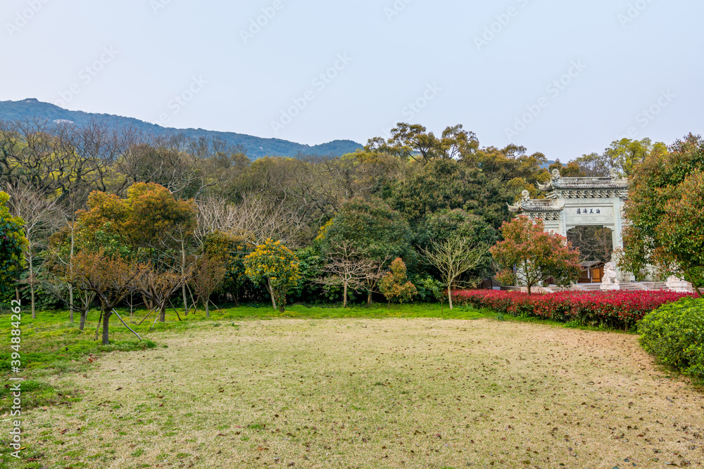 A Chinese traditional park and gate of Buddhist Fayu temple in ...