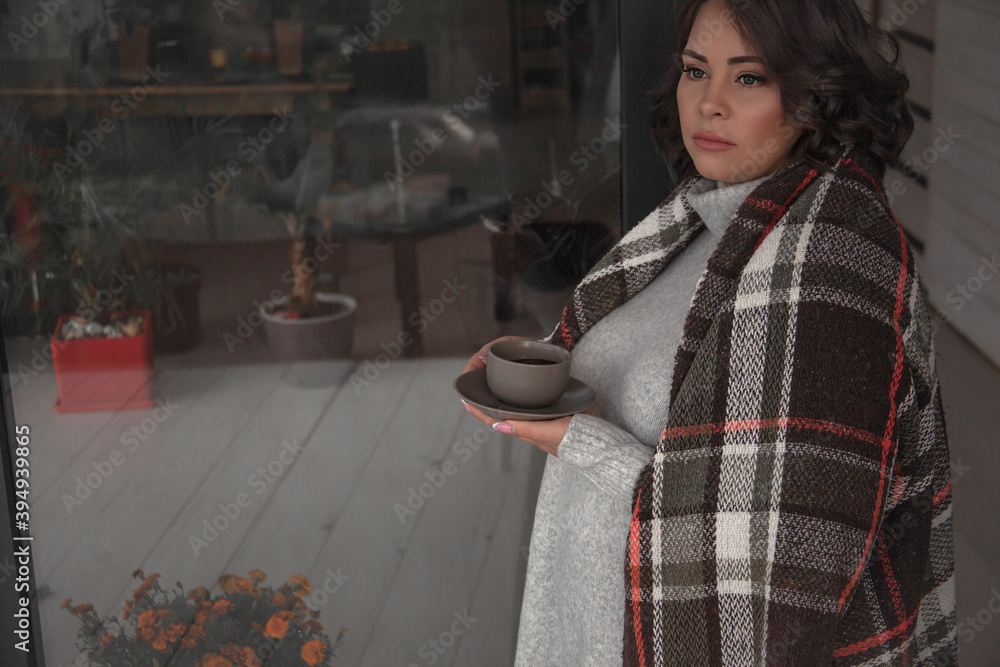 Beautiful fat woman dressed oversize sweater and blanket worth thinking ...