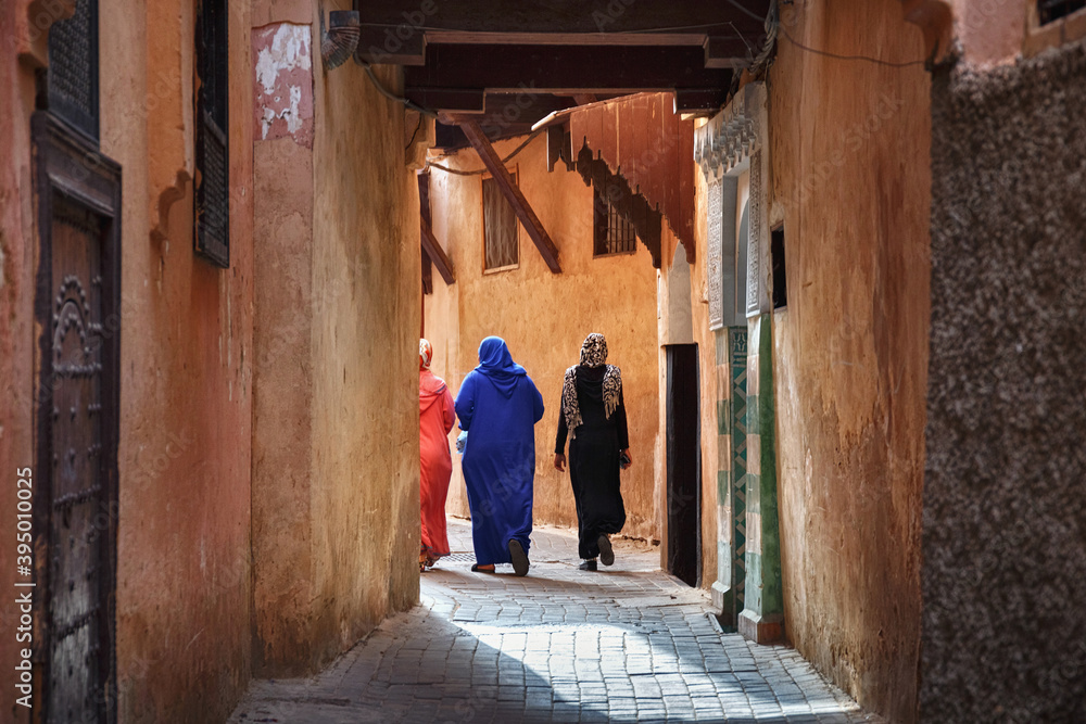 Unknown locals women in Meknes medina. Meknes is one of the four ...