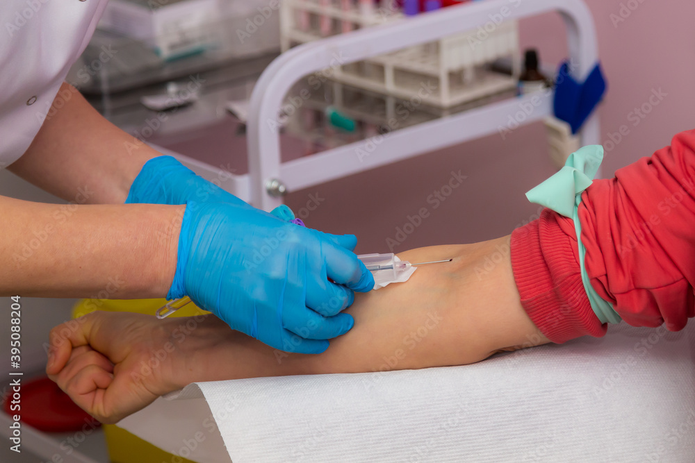 The process of taking venous blood for analysis in the clinic. Doctors ...