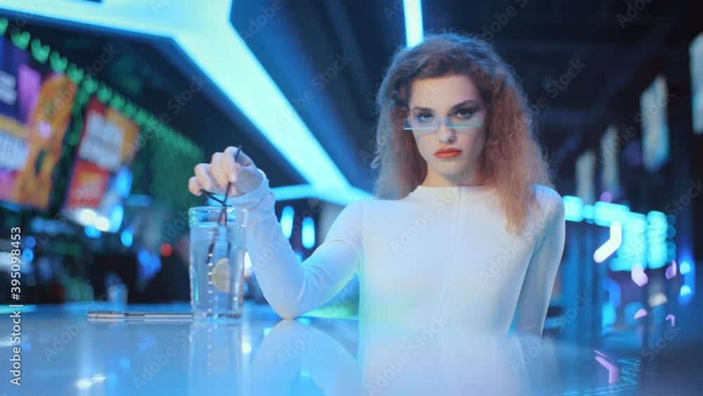 Portrait of lonely trendy woman in white outfit and stylish glasses ...