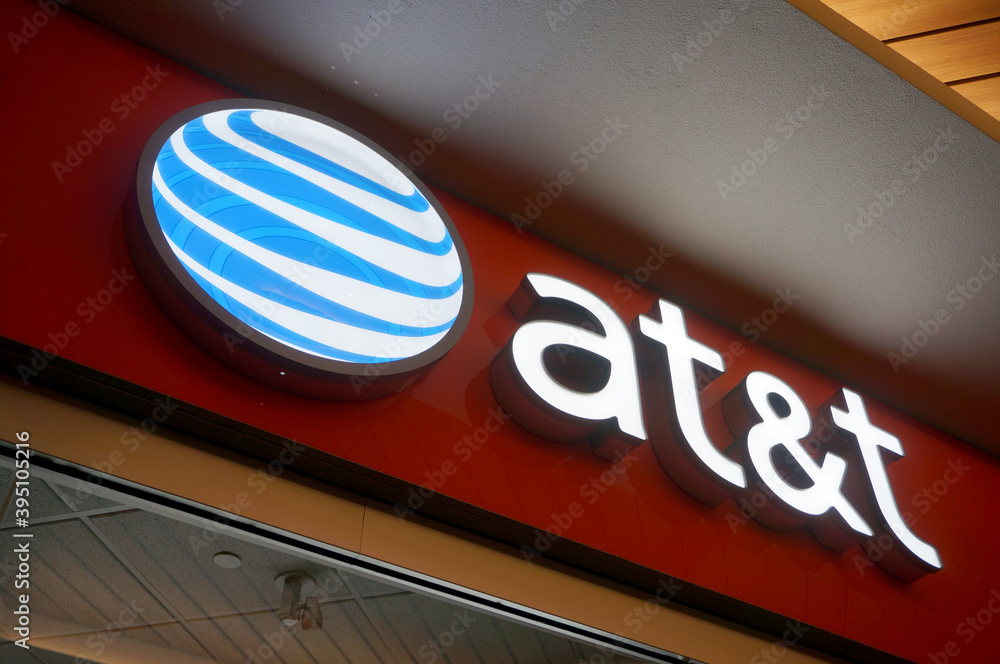 at&t Logo sign on wall above store in Ala Moana Mall Stock Photo ...