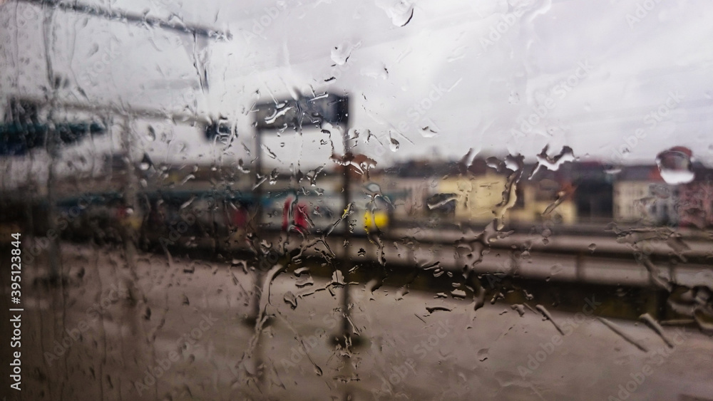 Rain drops on the window of a train on the station in Mechelen Belgium ...
